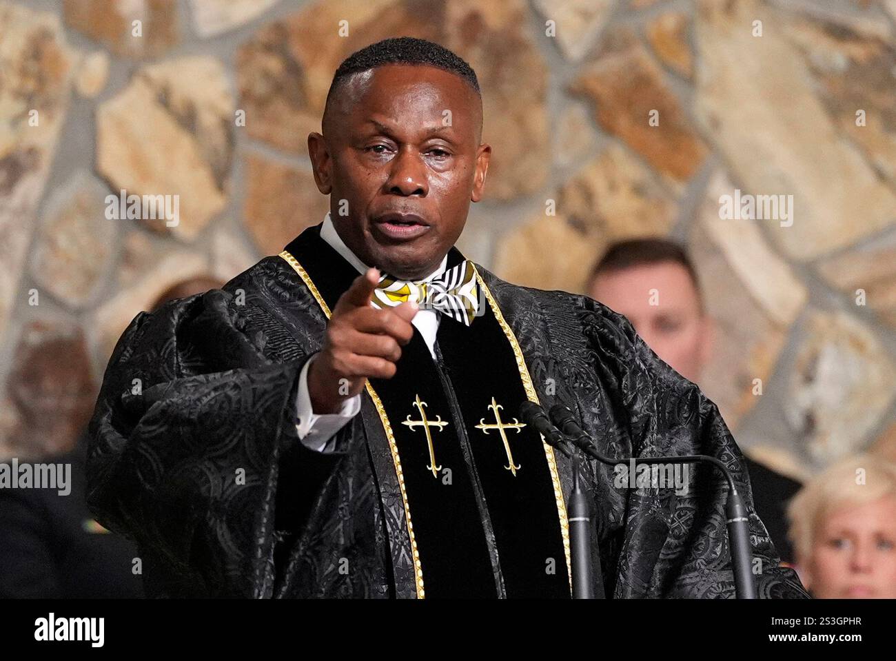 Pastor Tony Lowden speaks during the funeral service for former ...