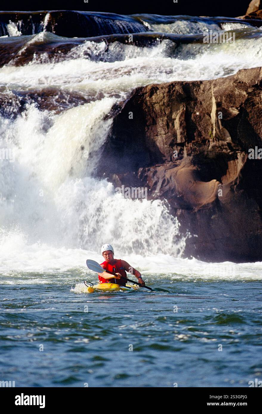 FIT YOUNG MAN KAYAKING IN YOUGHIOGHENY RIVER; OHIOPYLE STATE PARK ...