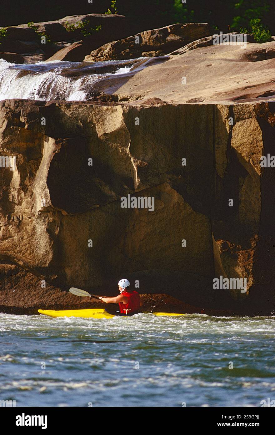 FIT YOUNG MAN KAYAKING IN YOUGHIOGHENY RIVER; OHIOPYLE STATE PARK ...