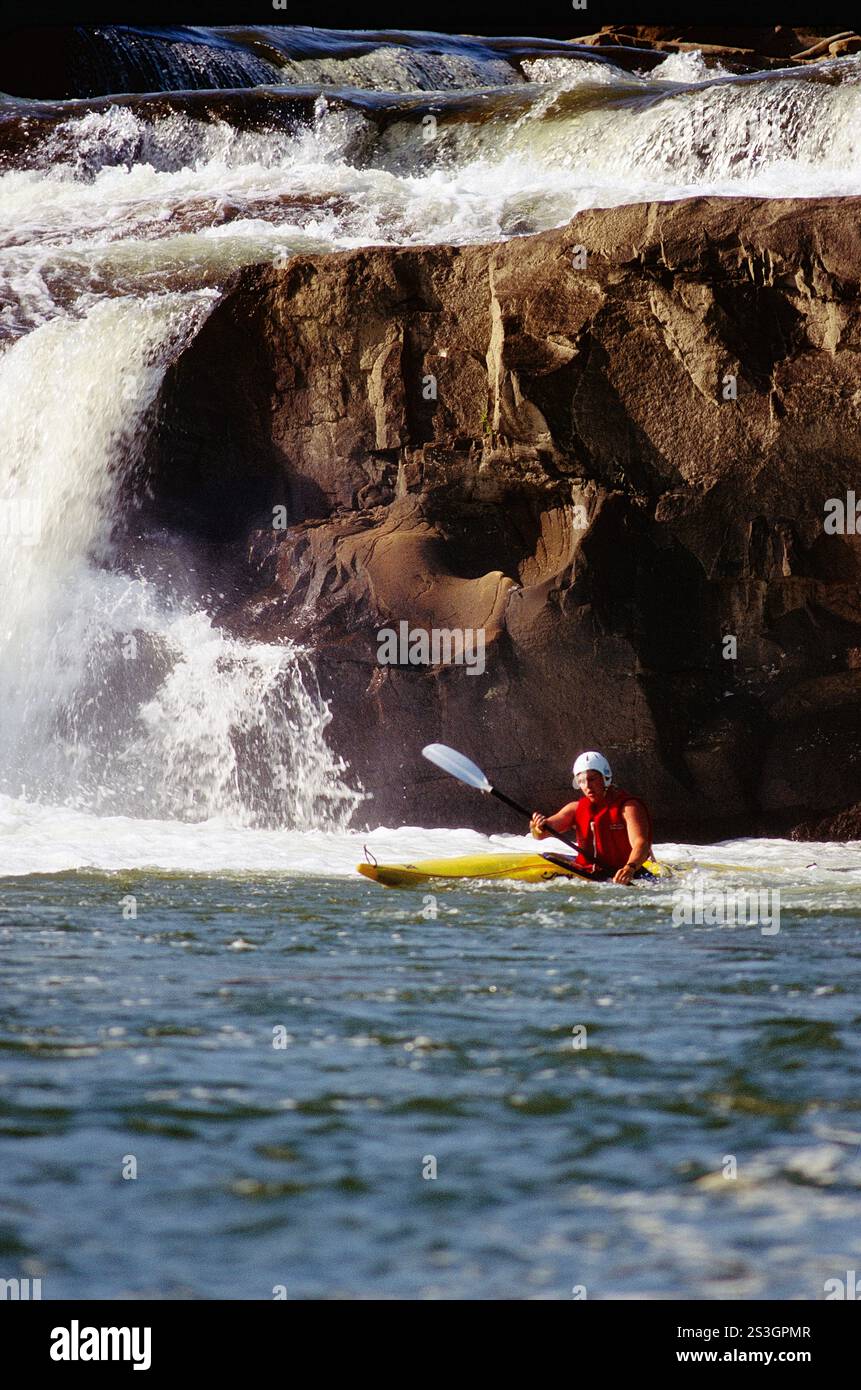 FIT YOUNG MAN KAYAKING IN YOUGHIOGHENY RIVER; OHIOPYLE STATE PARK ...