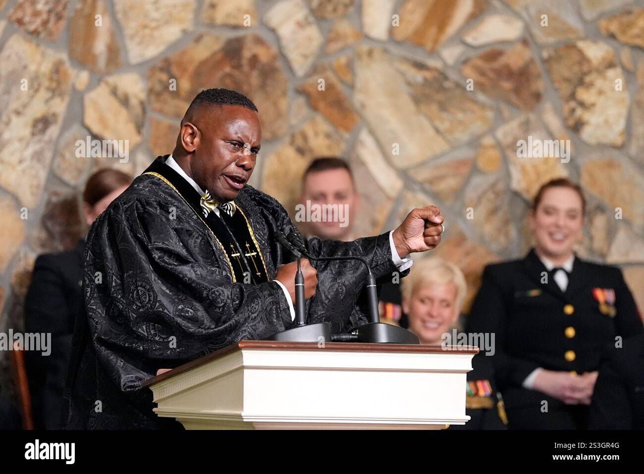 Pastor Tony Lowden speaks during the funeral service for former ...