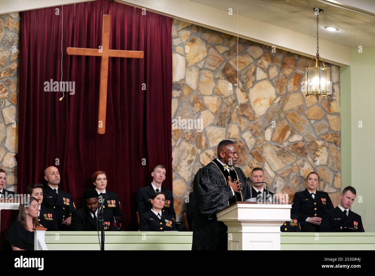 Pastor Tony Lowden speaks during the funeral service for former ...