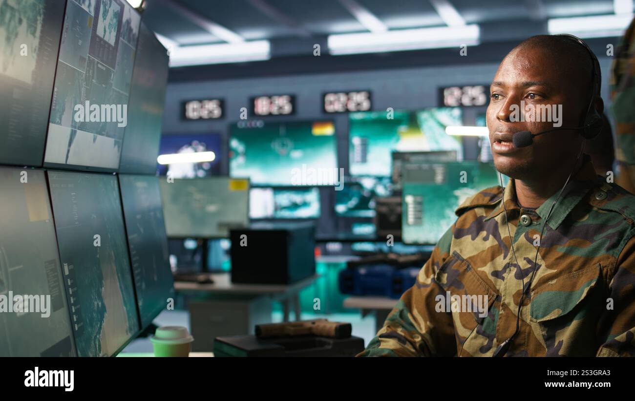 Army telecommunication systems operator using radio gear, providing ...