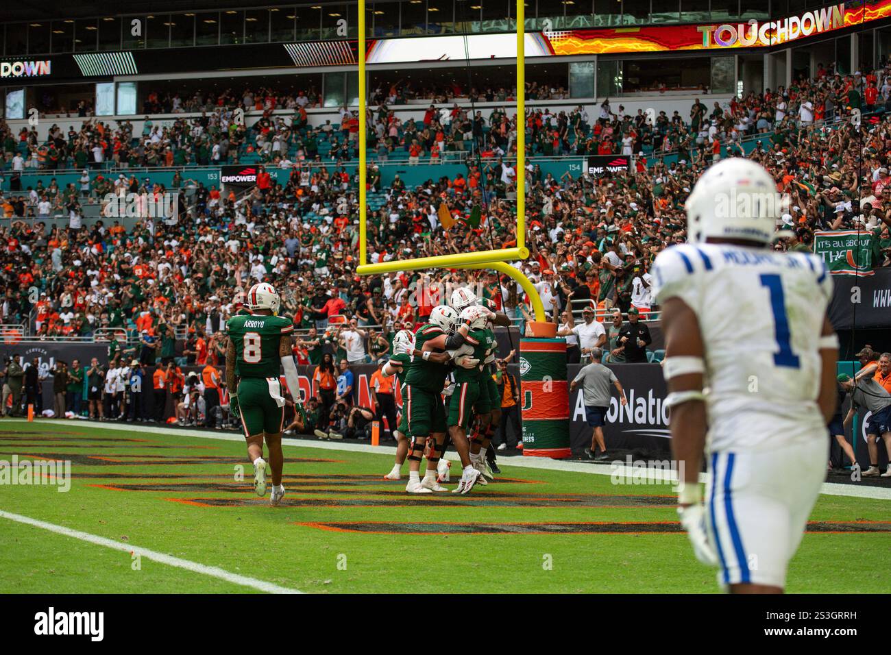 University of Miami celebrates a touchdown in the end zone during an ...