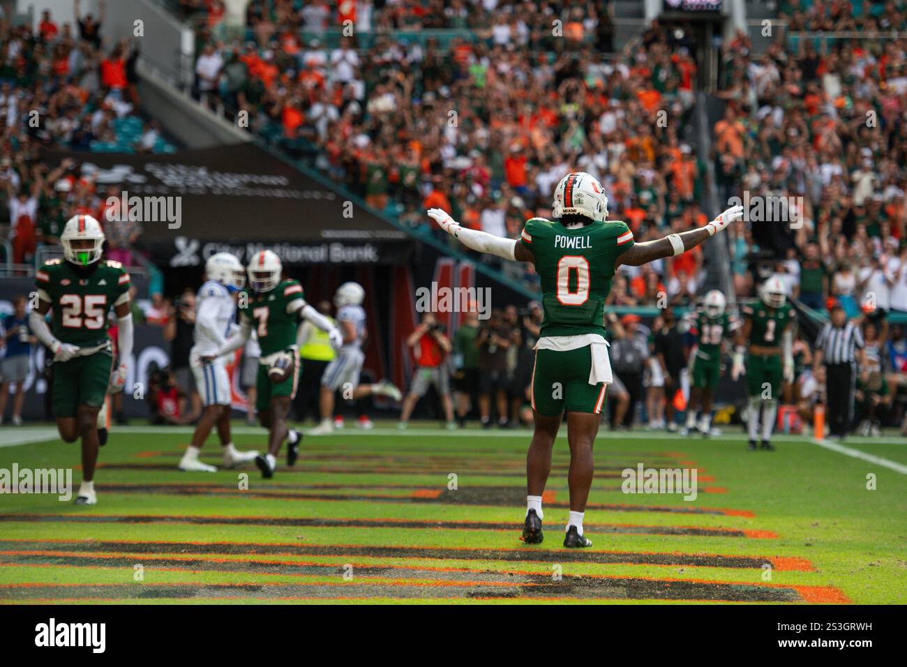 Miami defensive back Mishael Powell (0) celebrates in the end zone ...