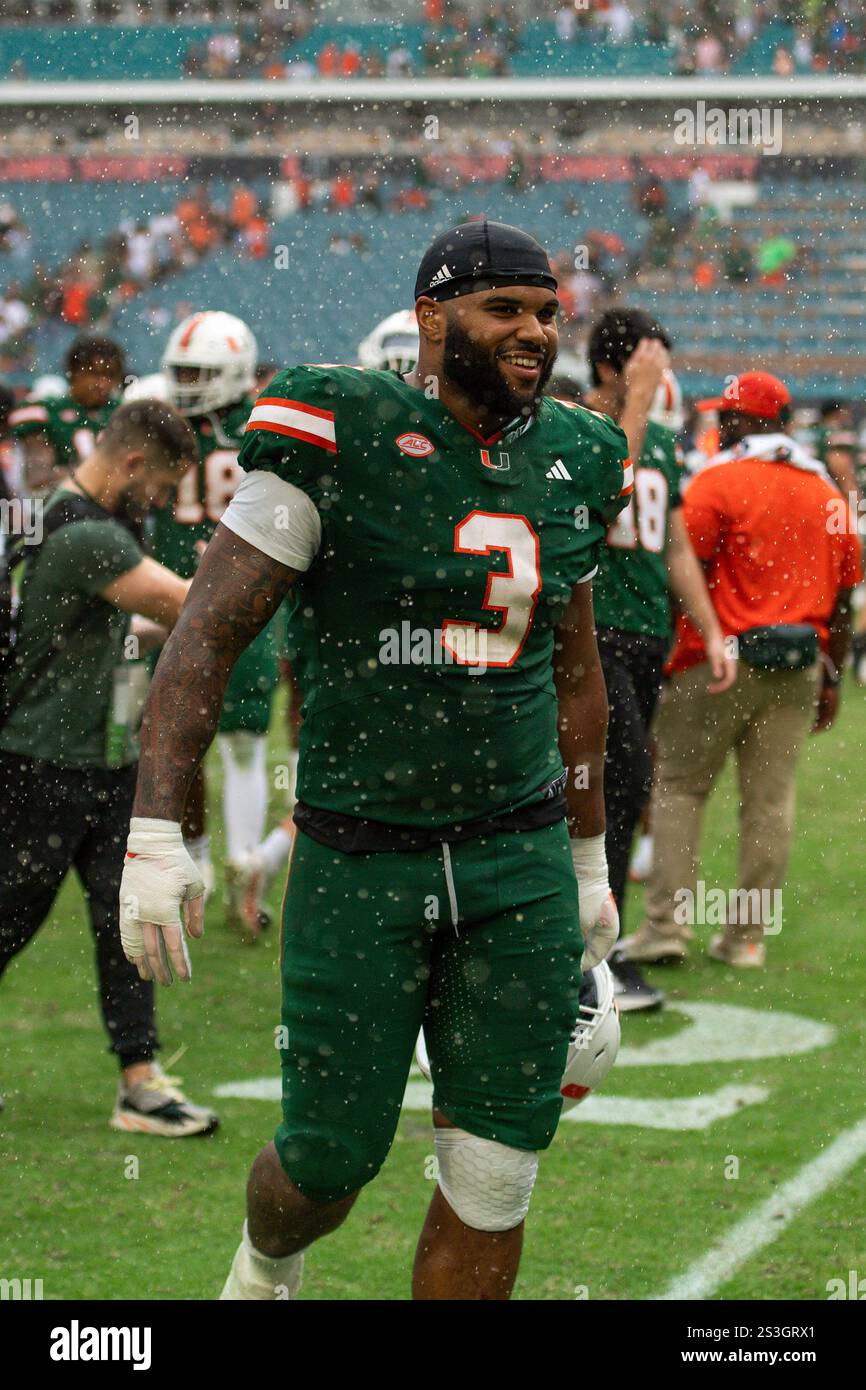 Miami defensive lineman Akheem Mesidor (3) celebrates after an NCAA ...