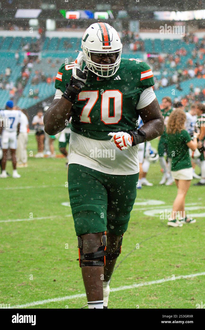 Miami offensive lineman Markel Bell (70) smiles after an NCAA football ...
