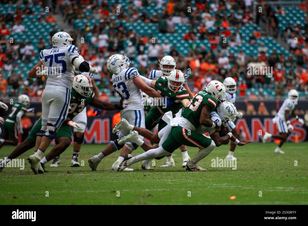 Miami defensive lineman Booker Pickett Jr. (33) sacks Duke quarterback ...