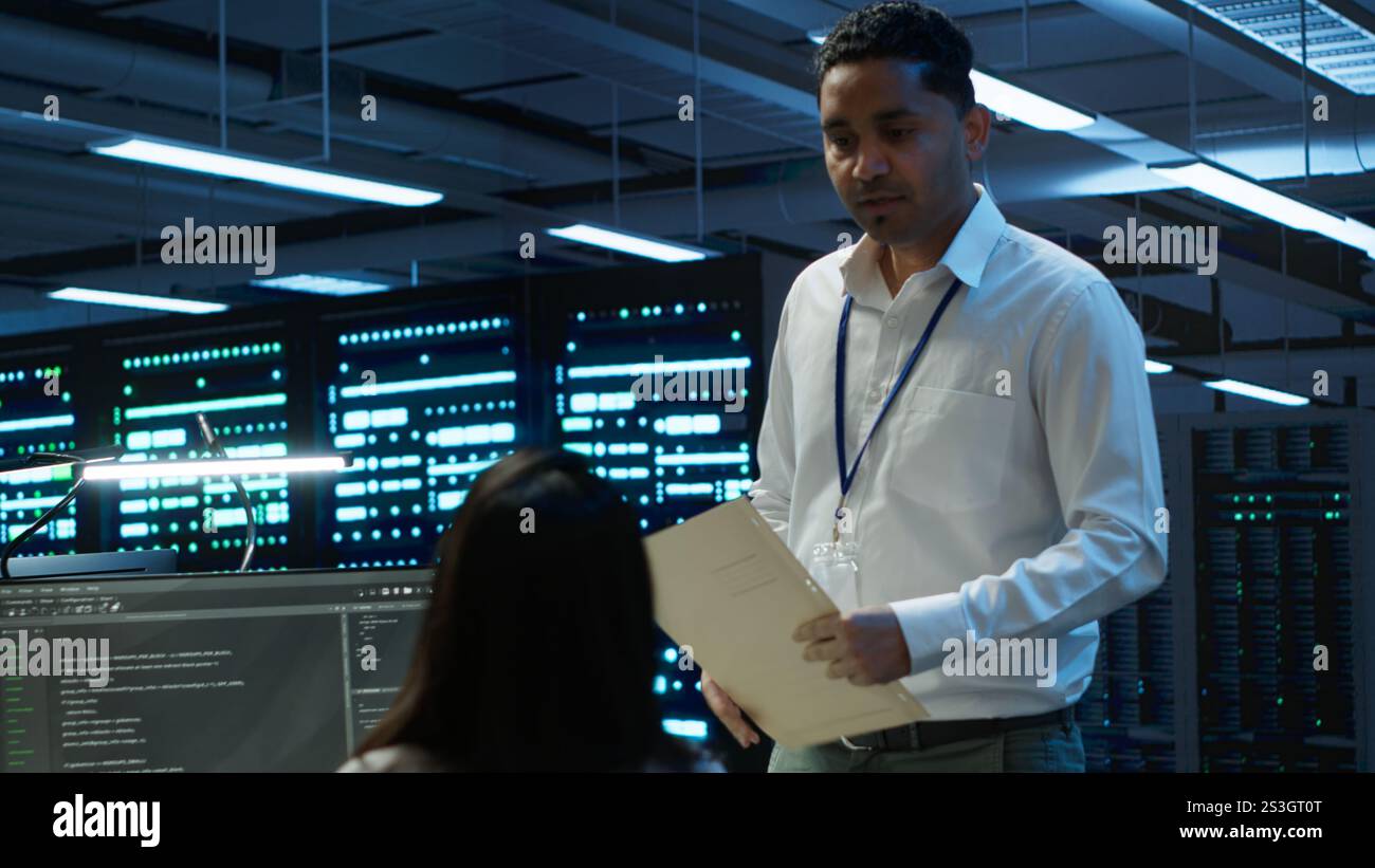 Management executive in data center ensuring system can handle ...