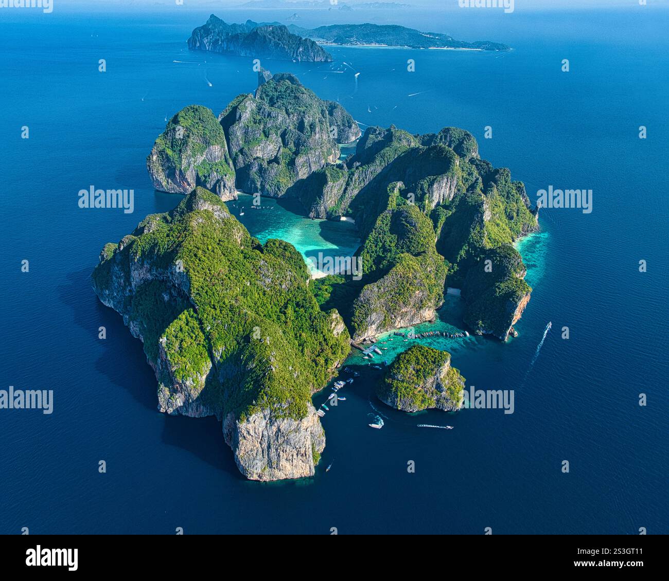 Aerial view of Maya Bay, Thailand, showcasing turquoise waters, lush ...