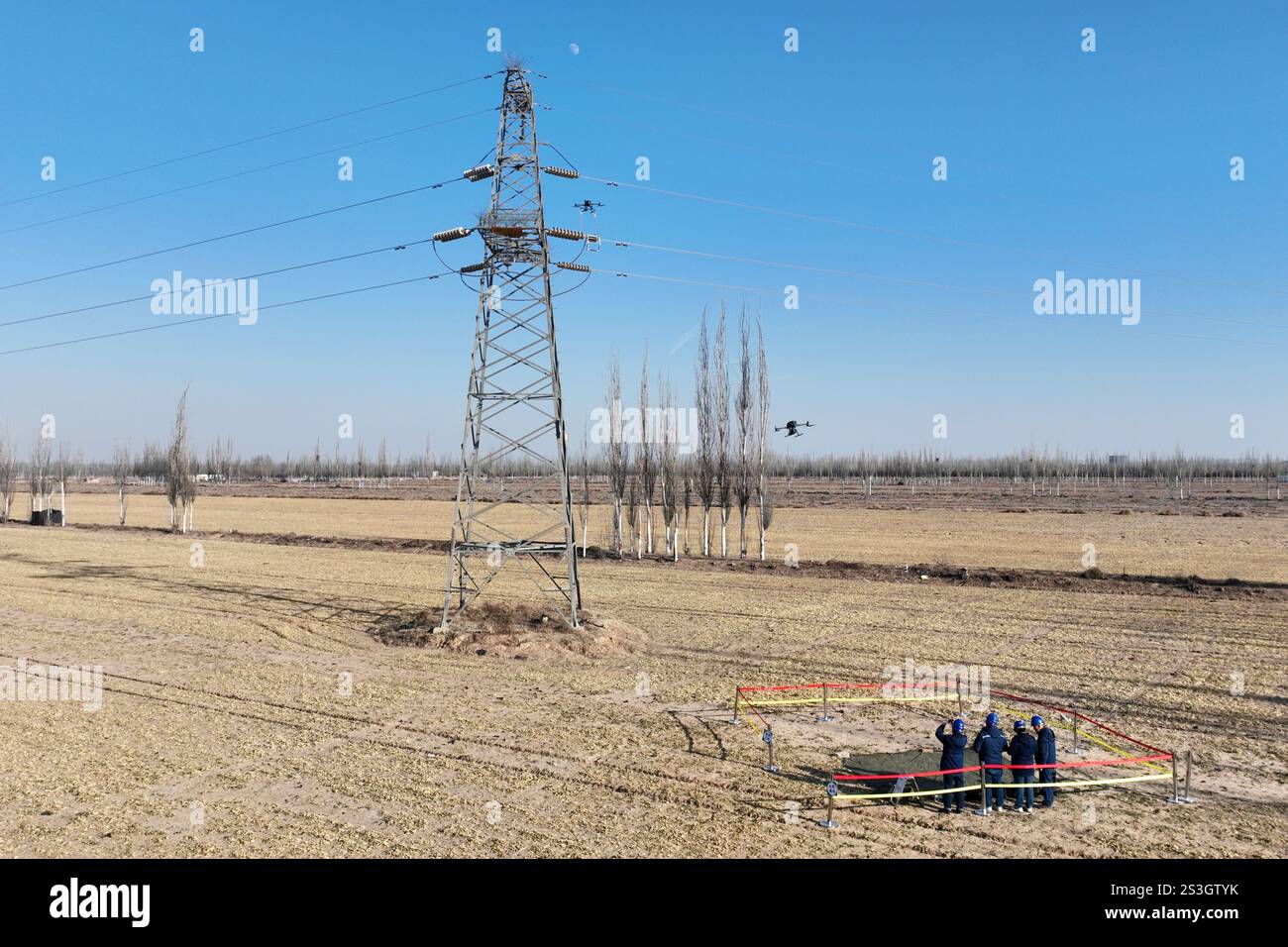 YINCHUAN, CHINA - JANUARY 9, 2025 - State Grid workers at the 110 kV ...