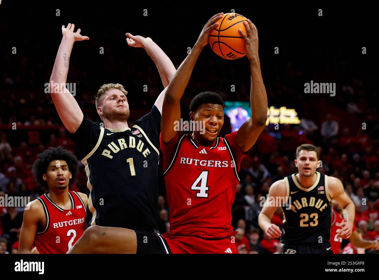 Rutgers guard Ace Bailey (4) is fouled by Purdue forward Caleb Furst (1 ...