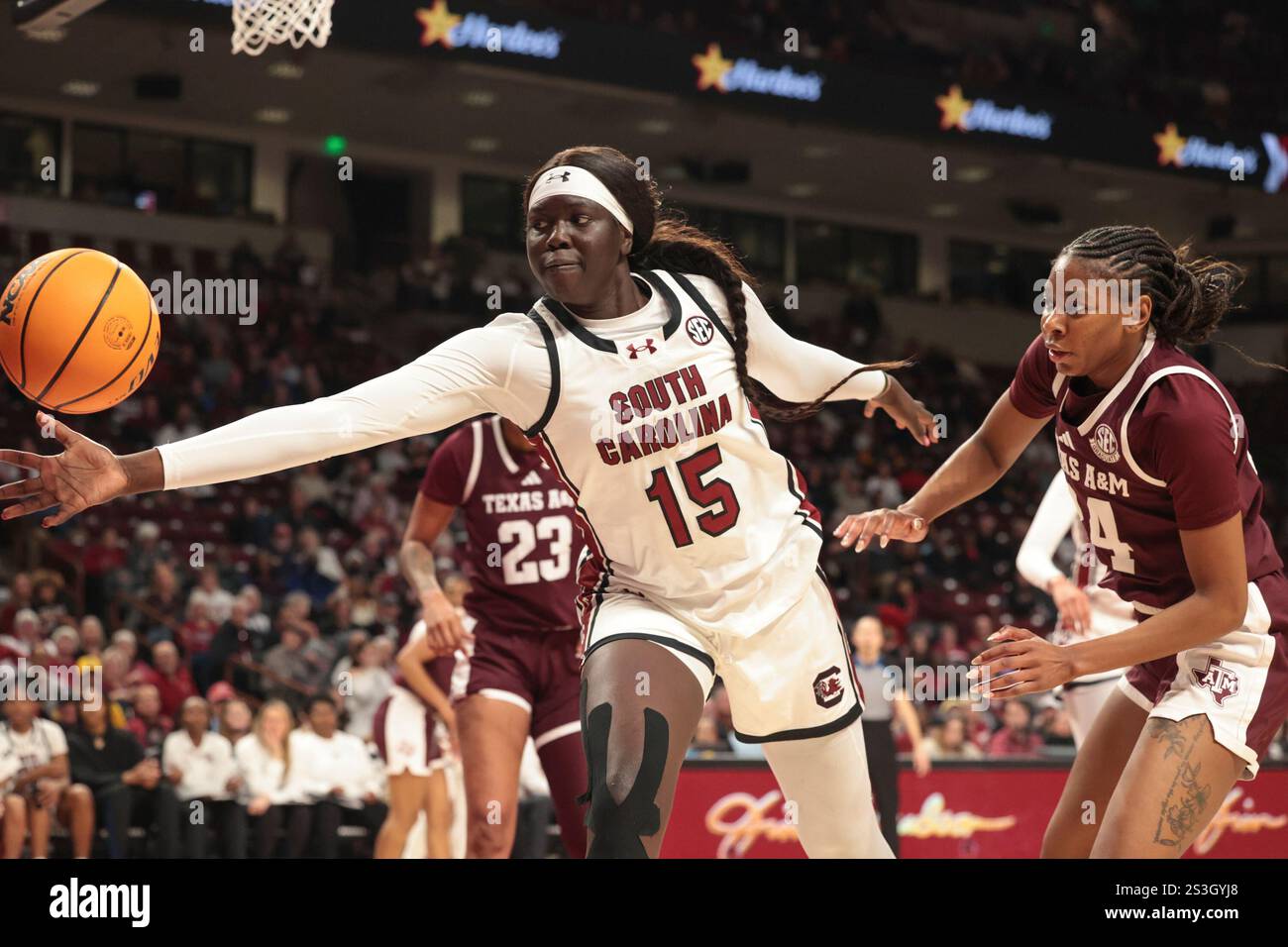 University of South Carolina's Adhel Tac (15) reaches for the ball as ...