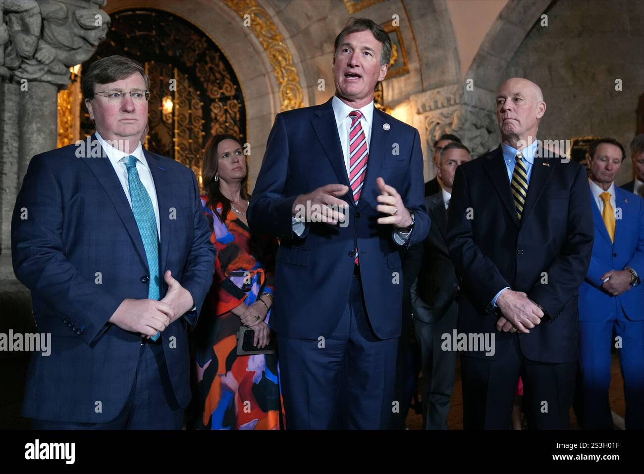 Virginia Gov. Glenn Youngkin, center, speaks as Mississippi Gov. Tate ...