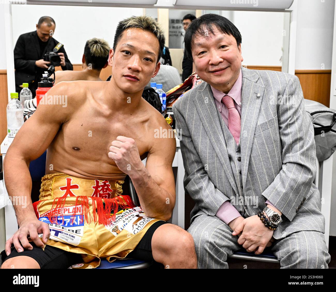 Champion Kazuki Nakajima, left, poses with Ohhashi Boxing Gym chairman ...