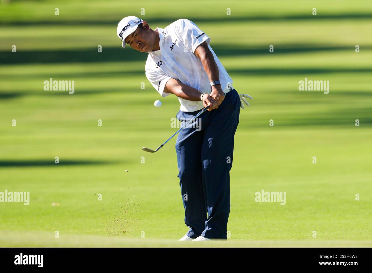 Hideki Matsuyama, of Japan, hits on the ninth green during the first ...