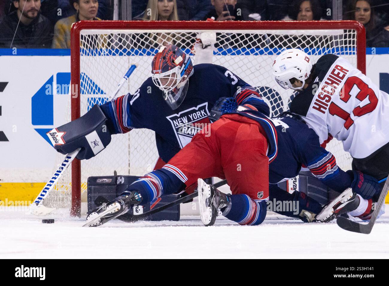 New York Rangers goaltender Igor Shesterkin (31) makes a save in the ...