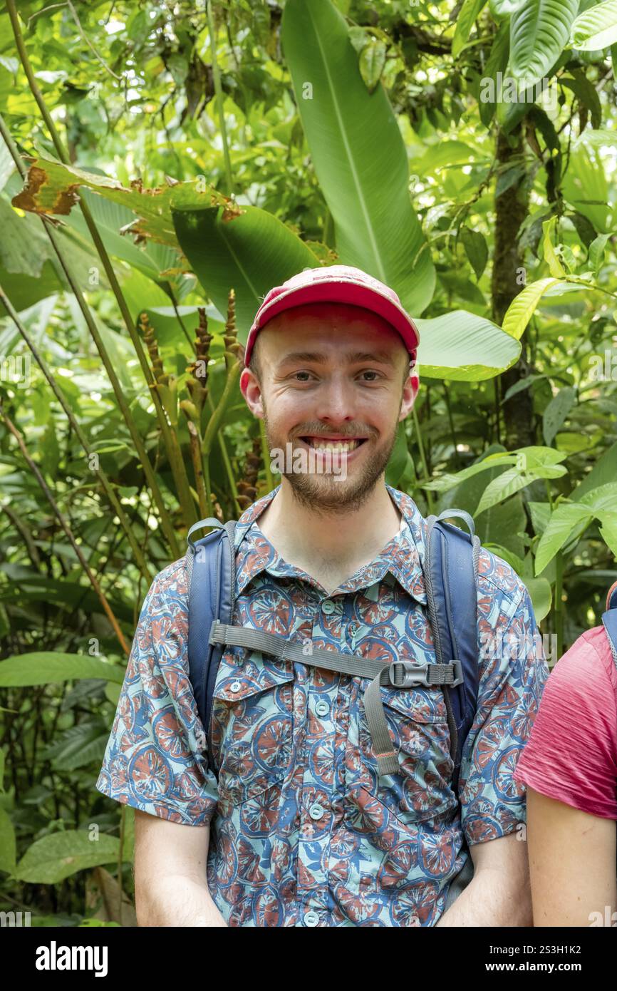 Tourist in the tropical rainforest, portrait, Corcovado National Park ...