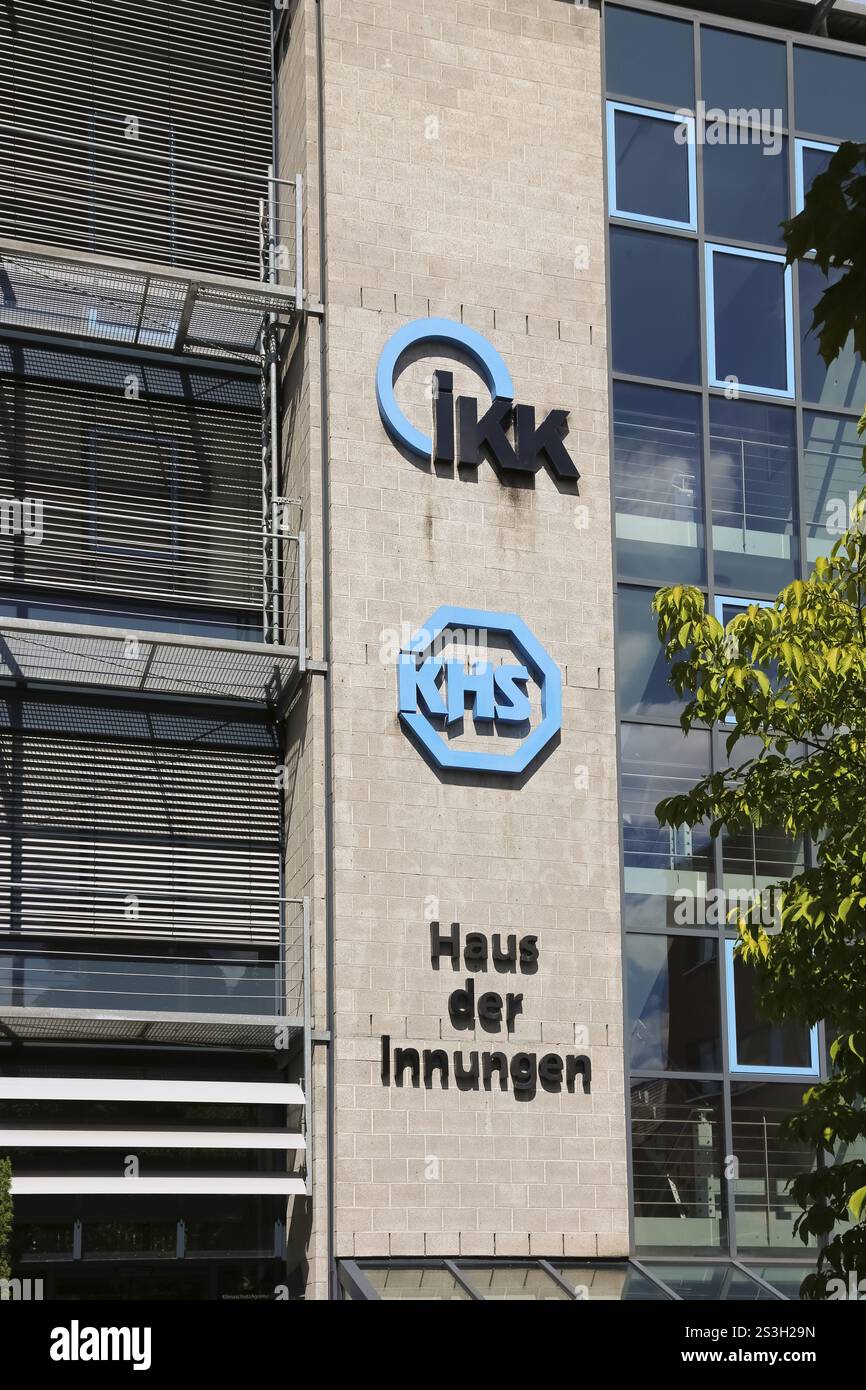 House of the guilds, facade with logos, IKK, health insurance company ...