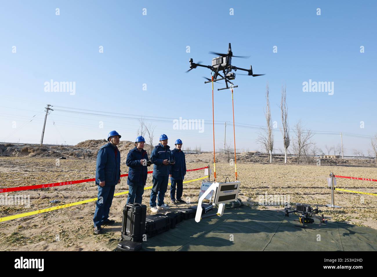 YINCHUAN, CHINA - JANUARY 9, 2025 - State Grid workers at the 110 kV ...