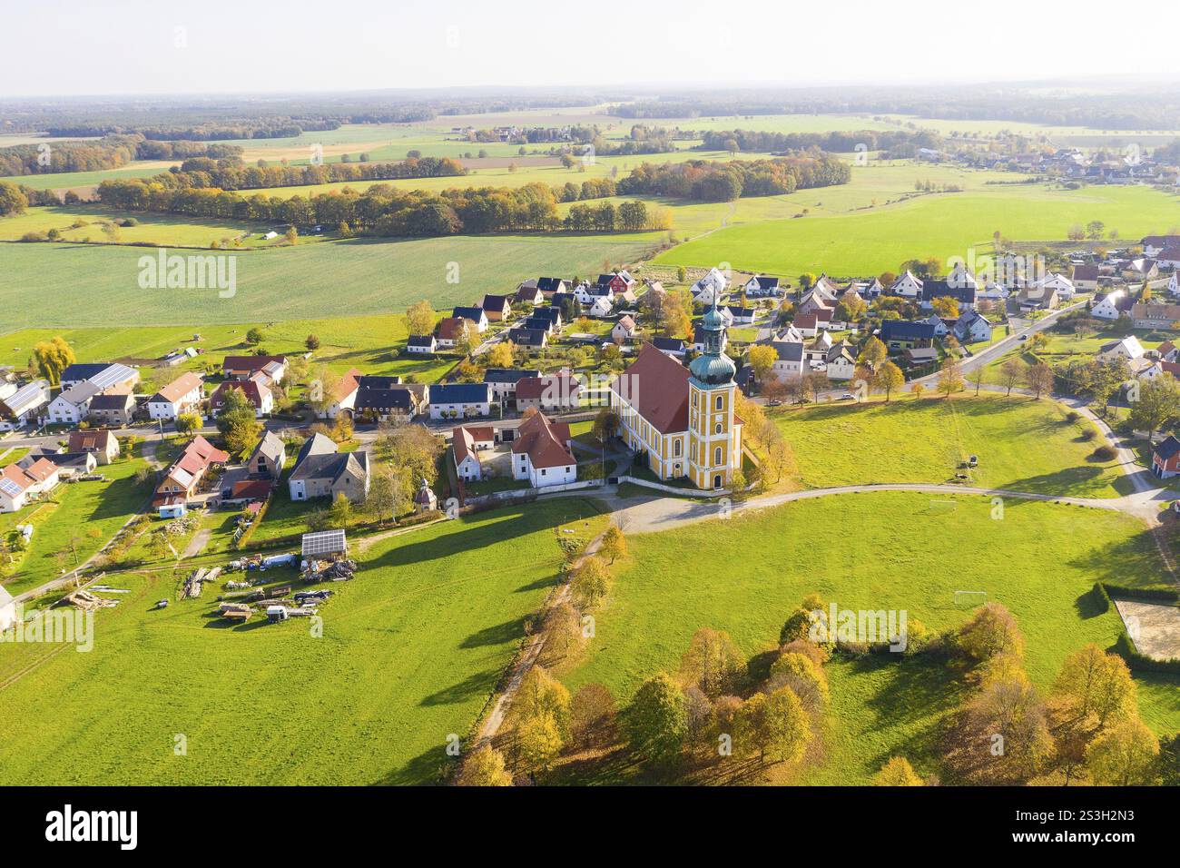 Aerial view of the pilgrimage church with monastery and village ...