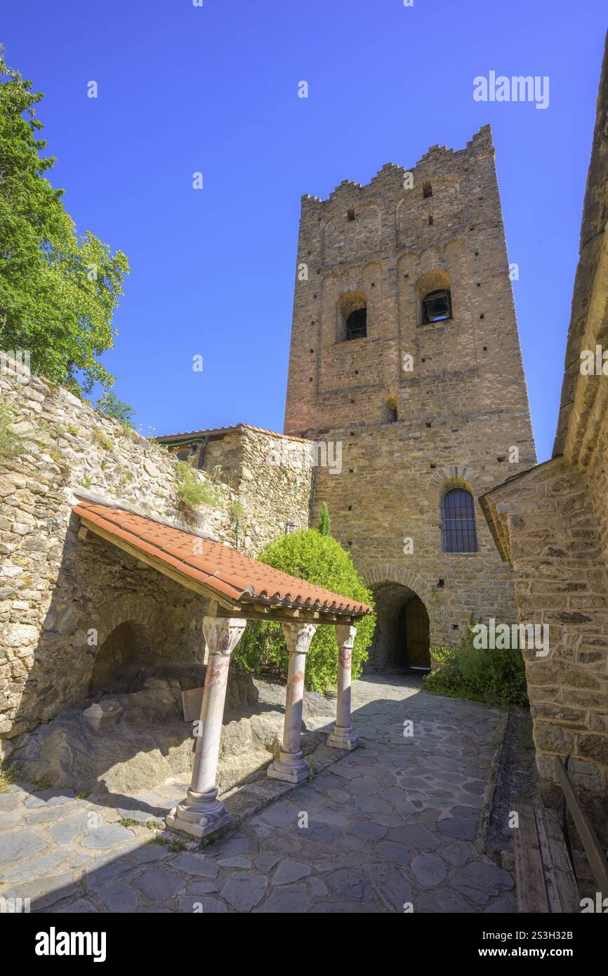 Church tower and rock-cut tomb of Count of Cerdagne Guifred Cabreta and ...