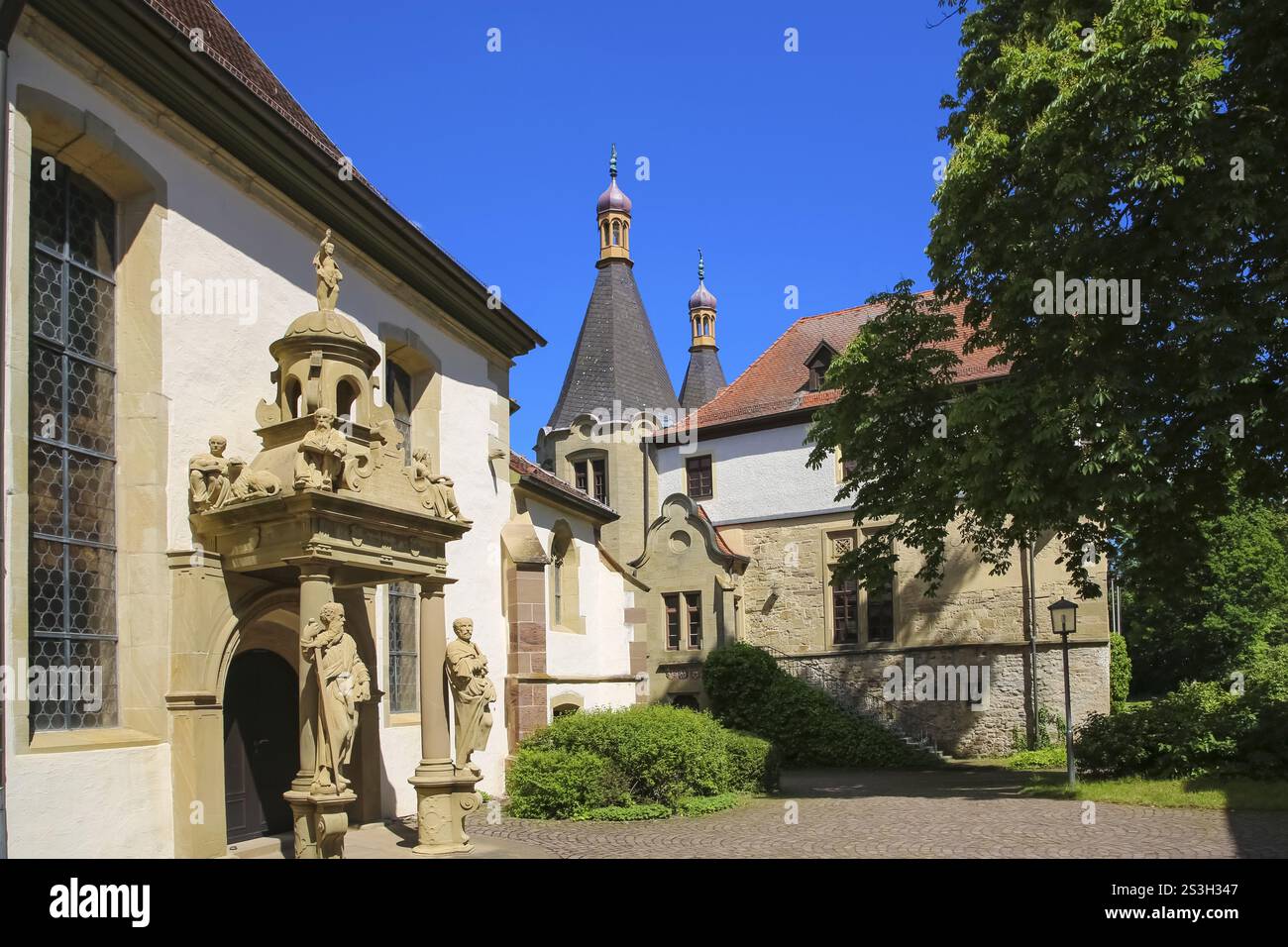 Laurentius Church on the left, Varbueler Castle on the right at the ...