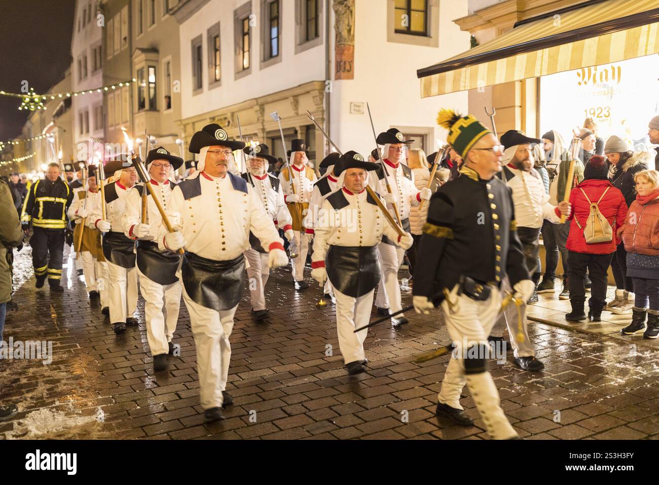 Mining parade through the old town centre of Freiberg, Erzgebirge ...