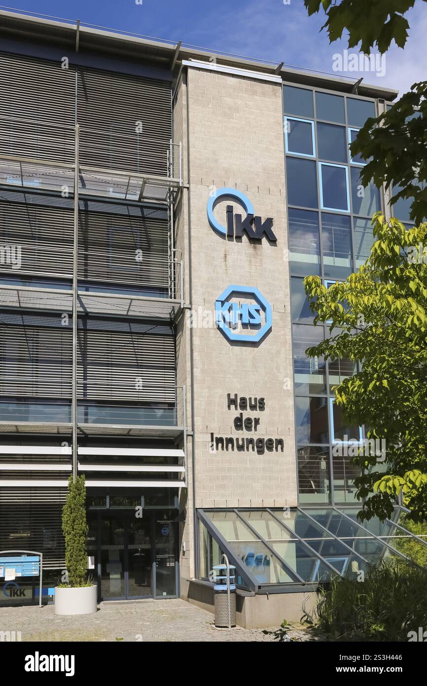 House of the guilds, facade with logos, IKK, health insurance company ...