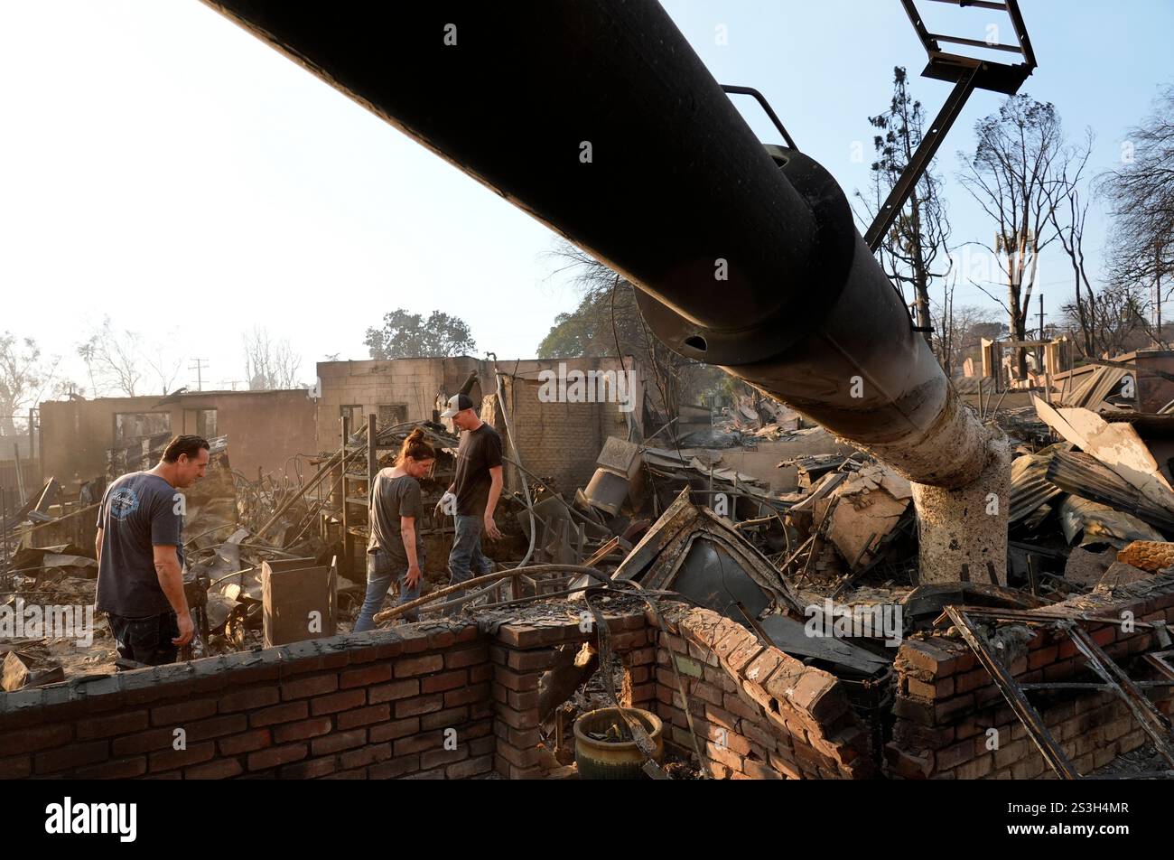 From left, Rob Ramsey, Christina Larson and Larson's husband Chris, the ...
