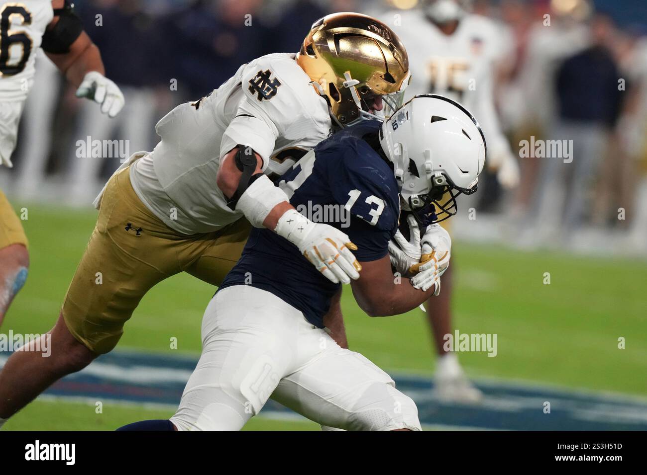 Notre Dame linebacker Drayk Bowen tackles Penn State running back ...
