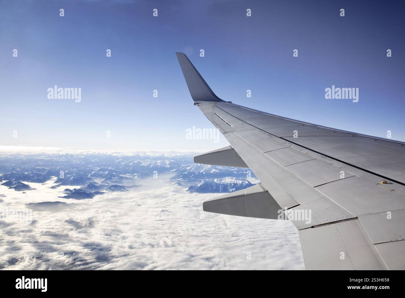 Wing of a passenger aircraft during take-off Stock Photo - Alamy