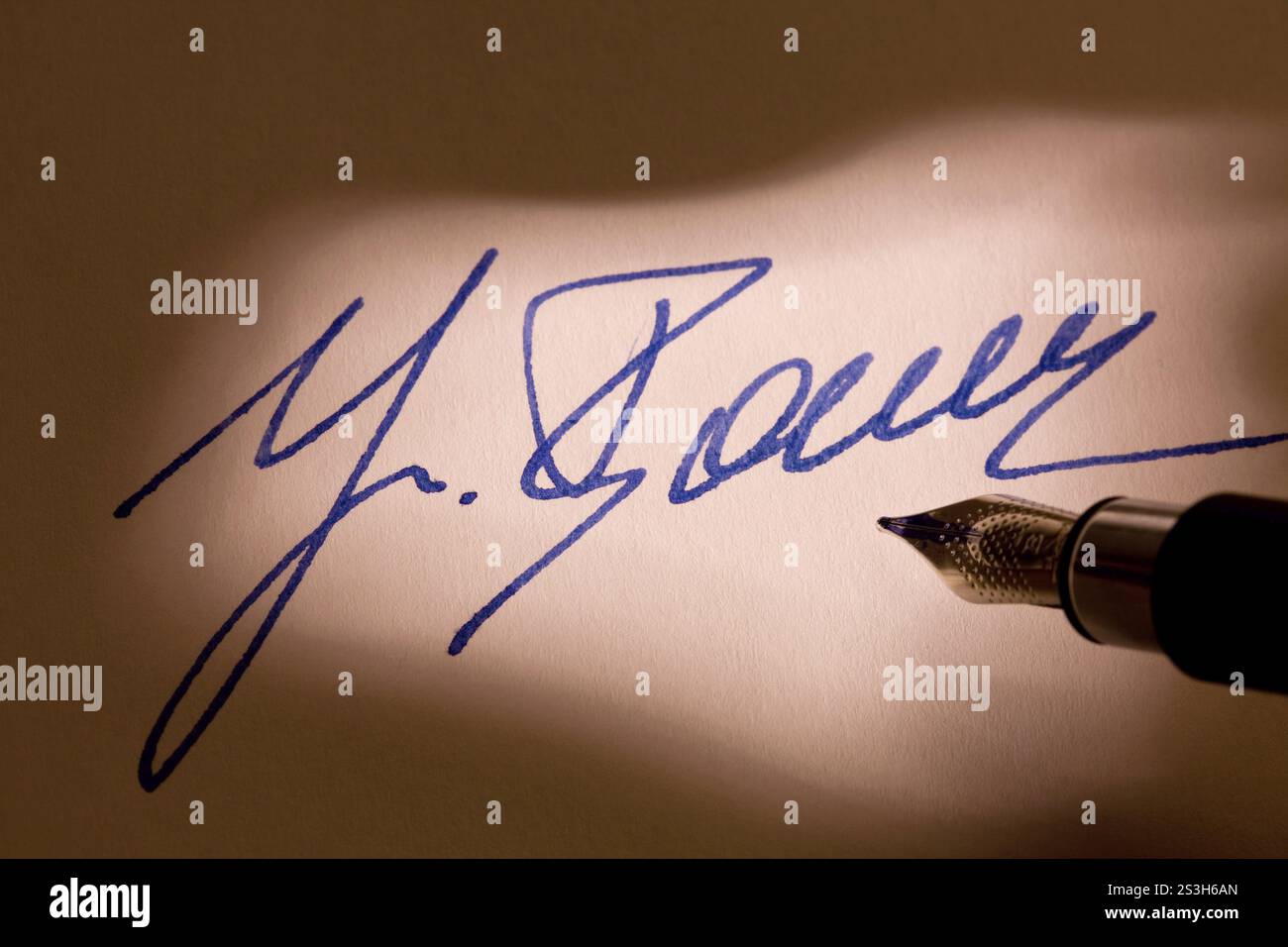 Handwritten signature with fountain pen under a letter Stock Photo - Alamy