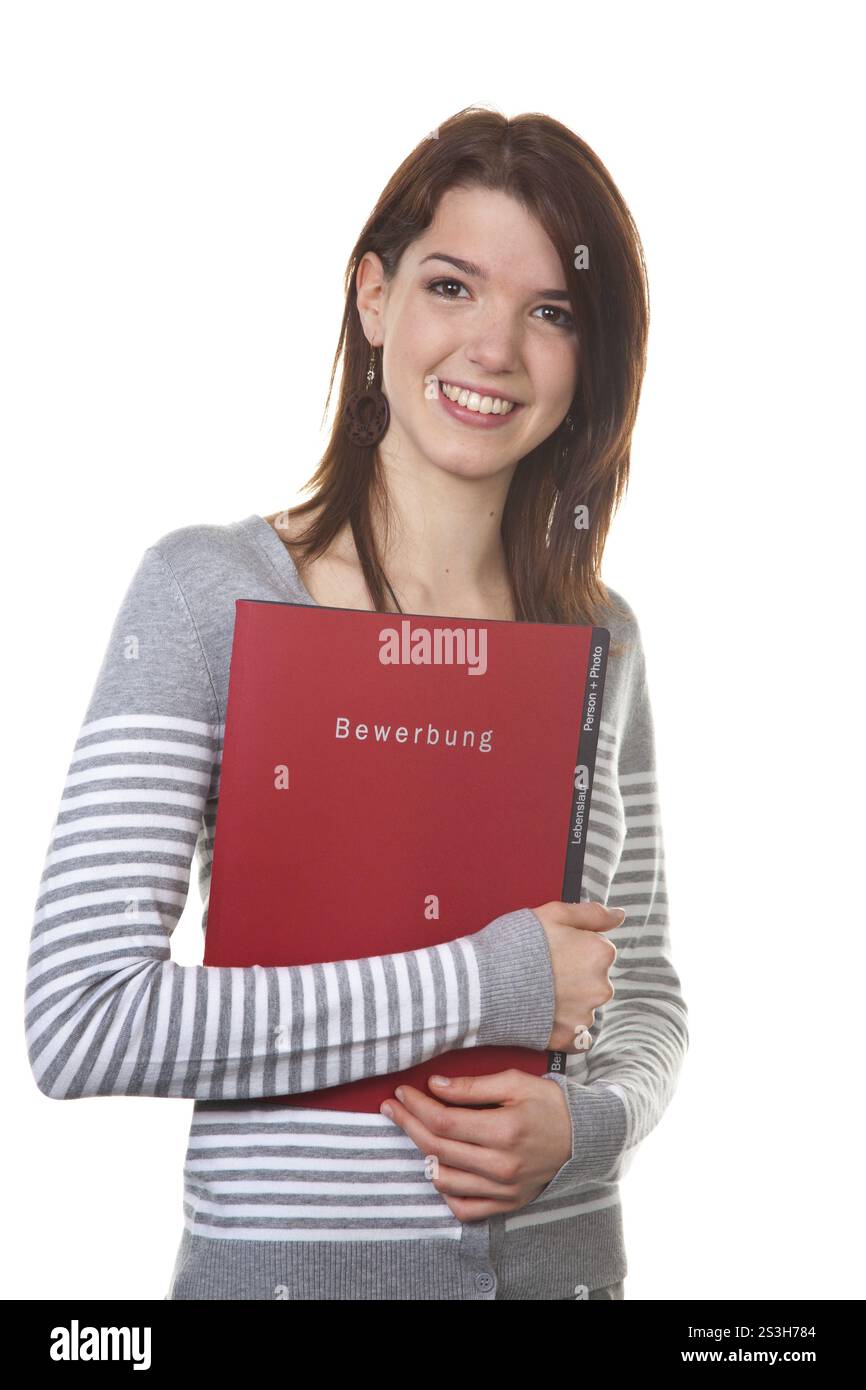 A pretty, radiant young girl with her application portfolio Stock Photo ...