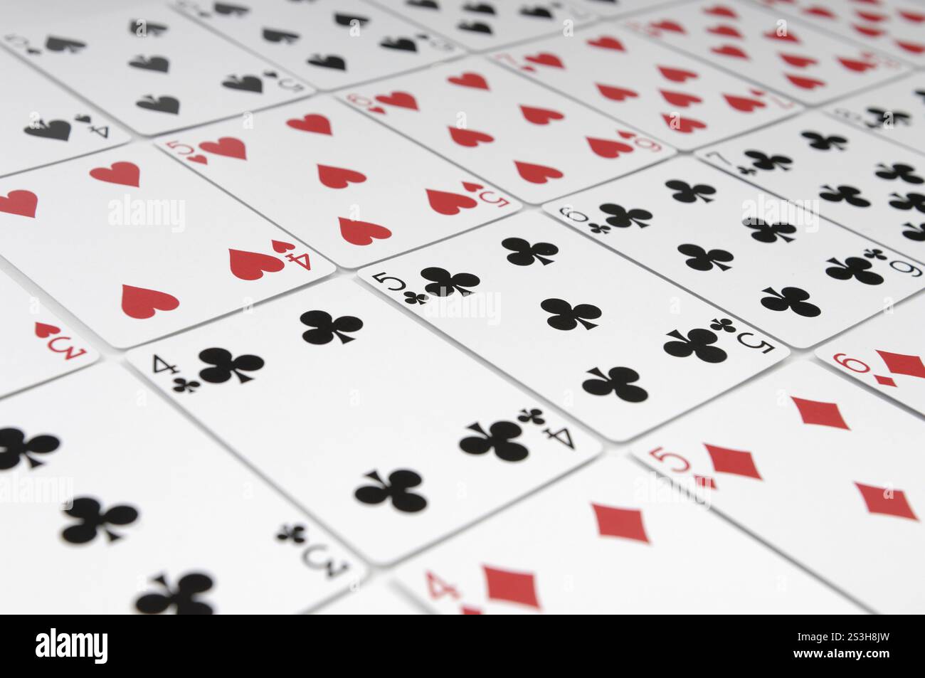 Playing cards abstract background Stock Photo - Alamy