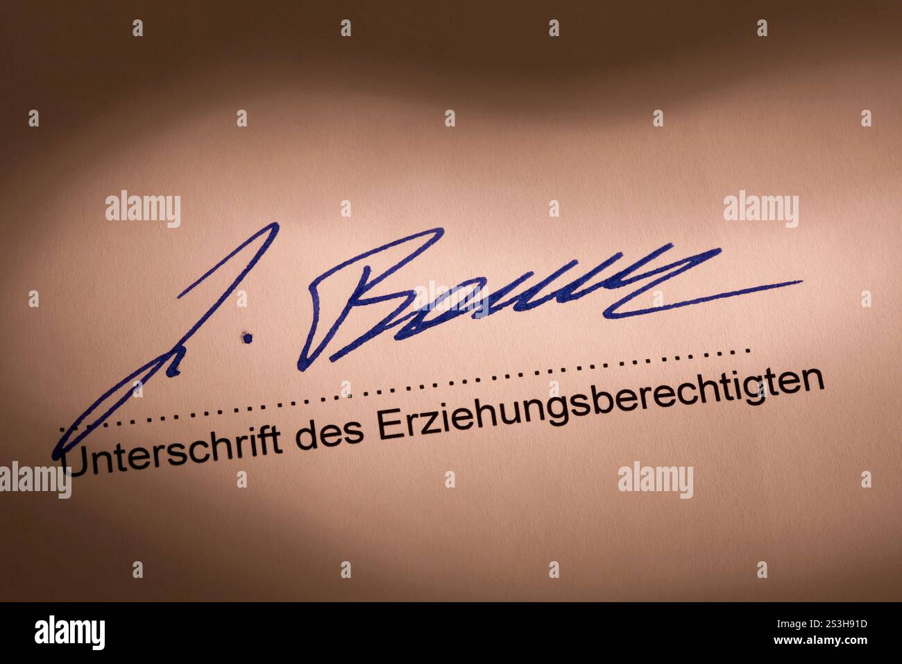 Handwritten signature under an official document of the school Stock ...