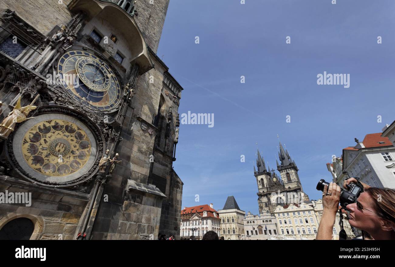 Astronomical clock in Prague and Church of the Virgin Mary Stock Photo ...