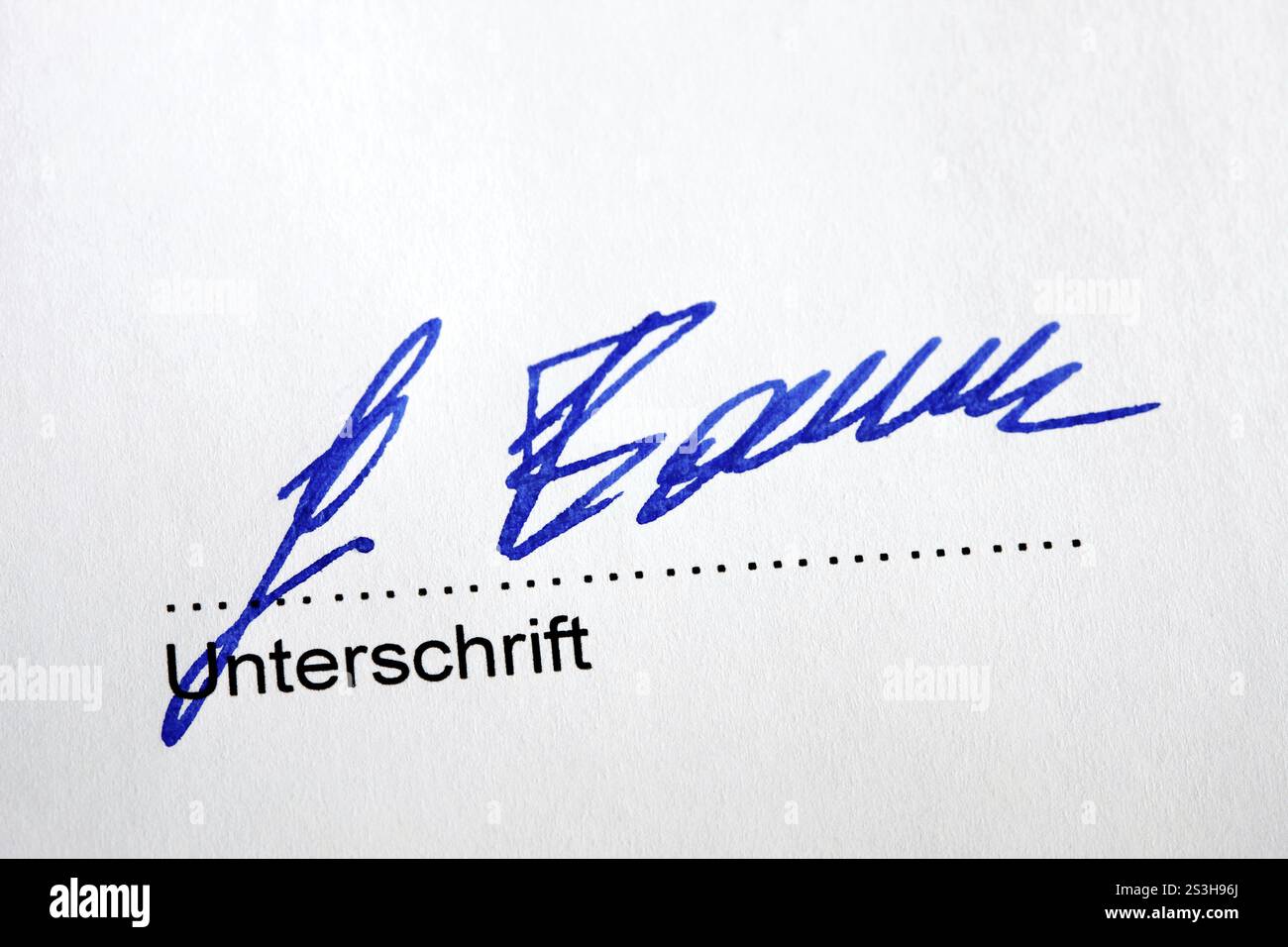 Handwritten signature with fountain pen under a letter Stock Photo - Alamy