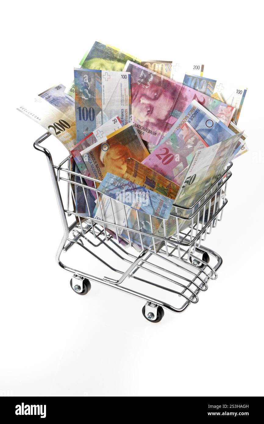 Money Swiss franc banknotes in a shopping basket, Switzerland, Europe ...