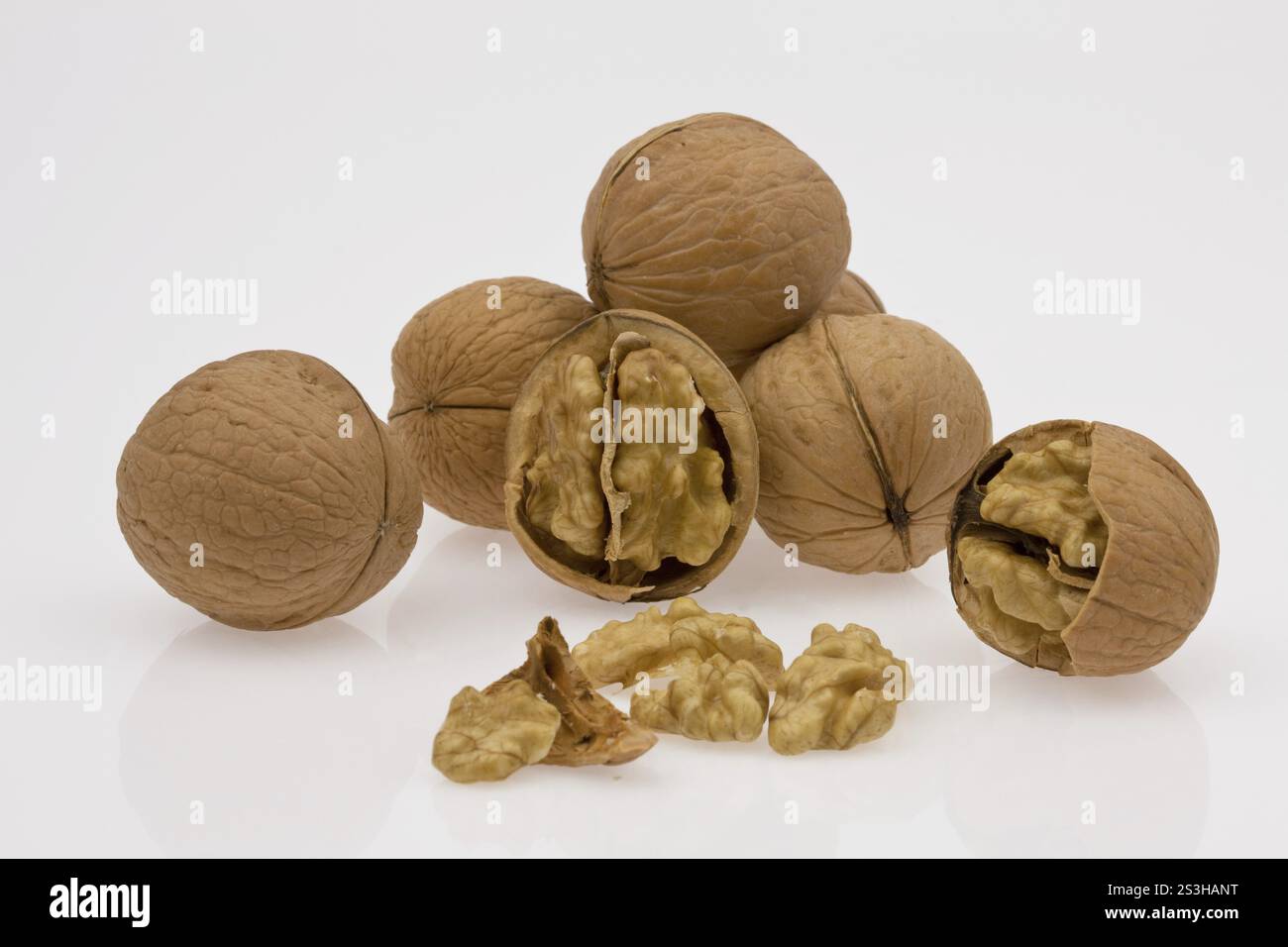 Walnut with shell and opened Stock Photo - Alamy