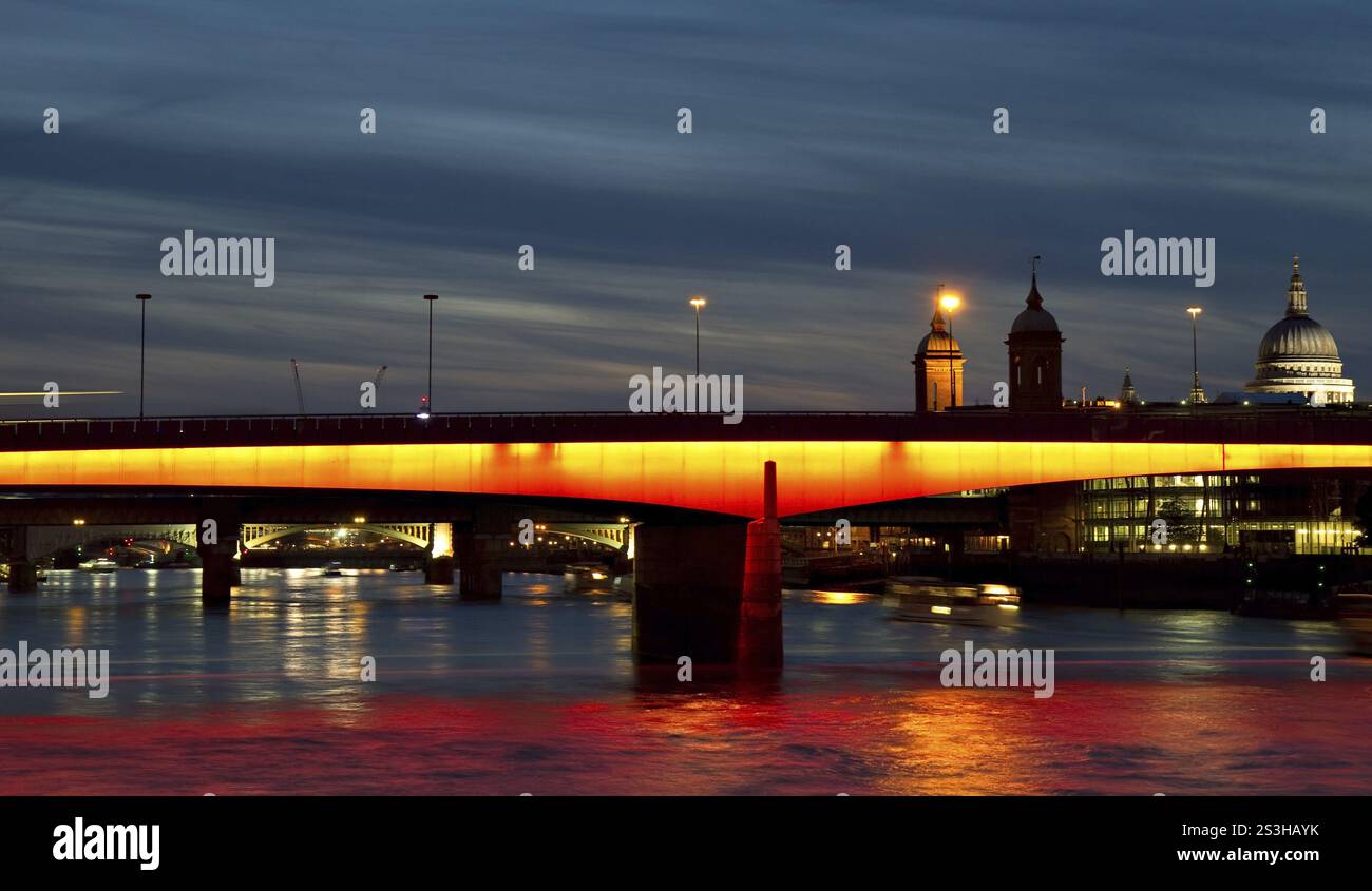 Illuminated London Bridge with Saint Paul's Cathedral in the background ...