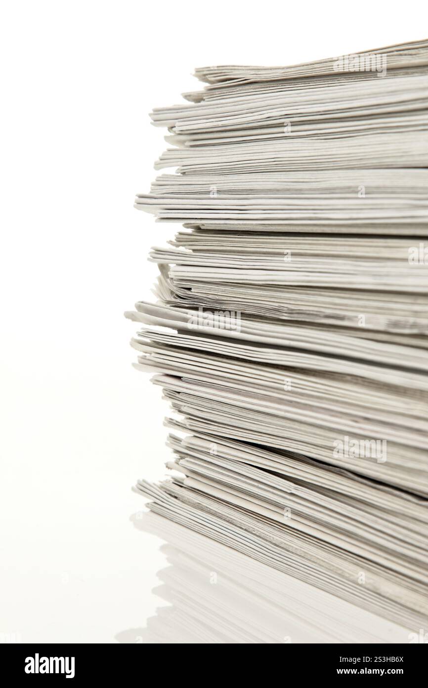 Old newspapers and magazines in a pile Austria Stock Photo - Alamy