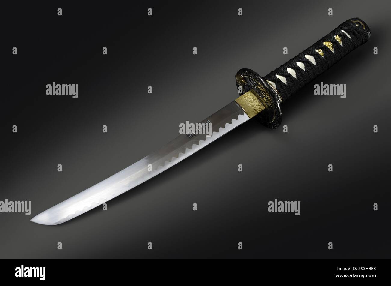 Short samurai sword Japanese Tanto Closeup of a blade isolated with ...