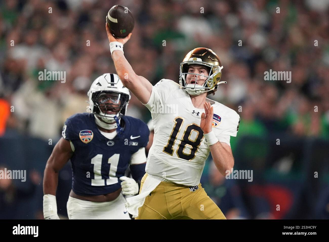 Notre Dame quarterback Steve Angeli (18) aims a pass during the first ...