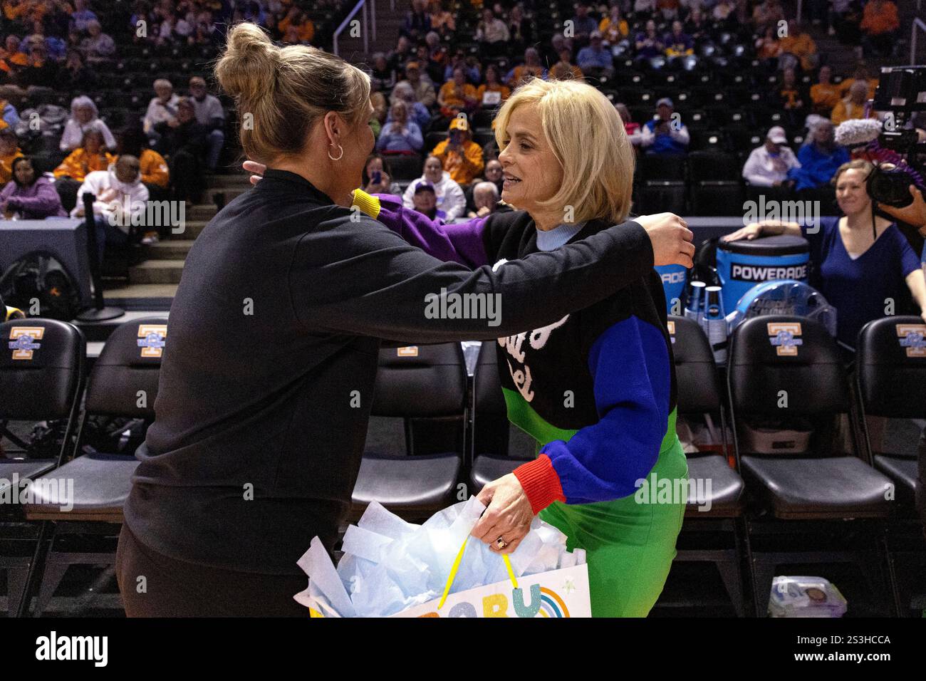 LSU head coach Kim Mulkey and Tennessee head coach Kim Caldwell embrace ...