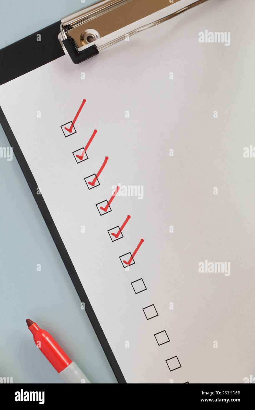 Checklist boxes close up with red ticks, check marks Stock Photo - Alamy