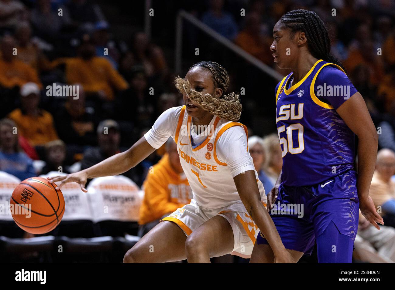 Tennessee guard Samara Spencer (7) hair wraps across her face as she ...