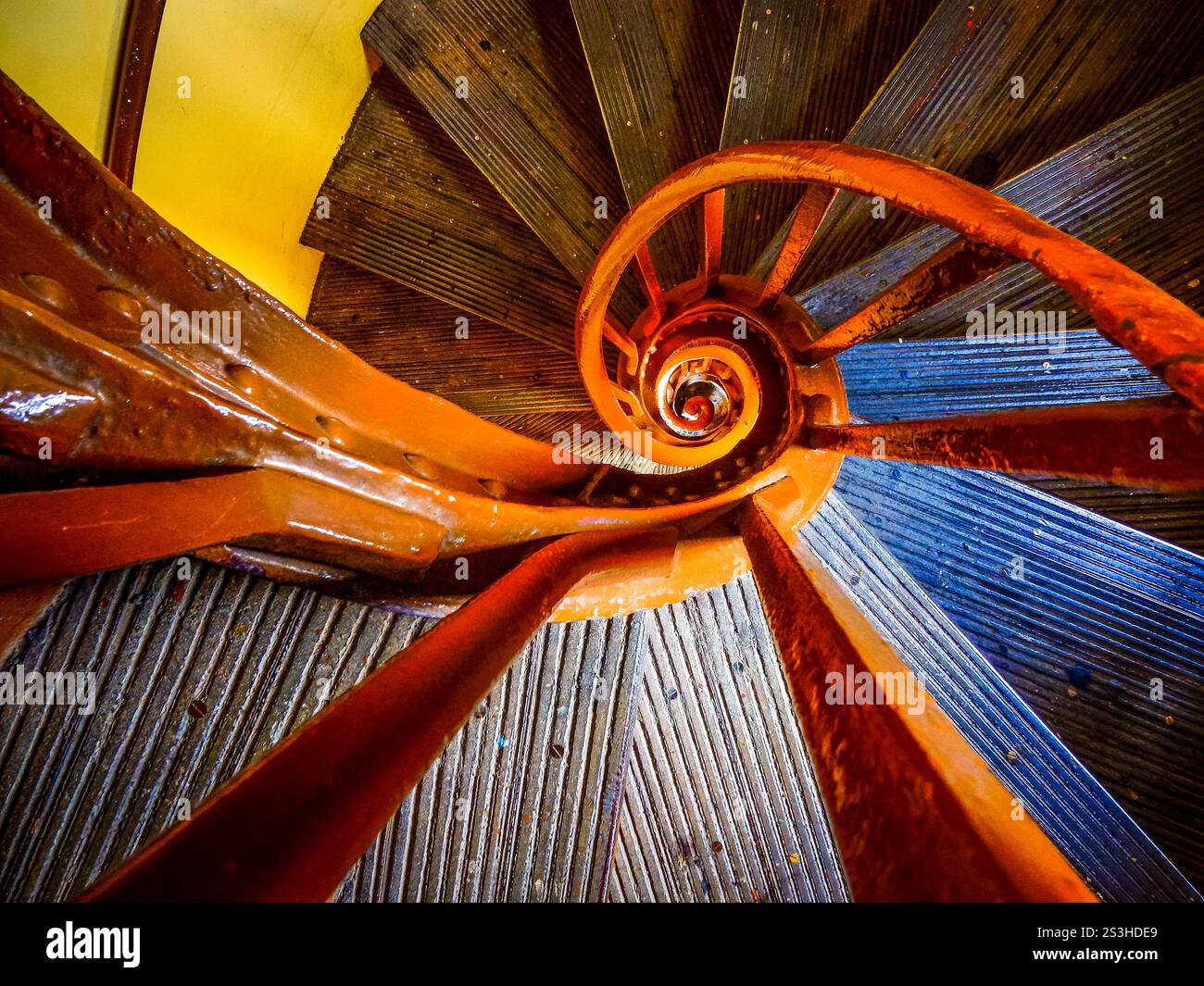 A striking spiral staircase inside Tower Bridge, London, showcases ...