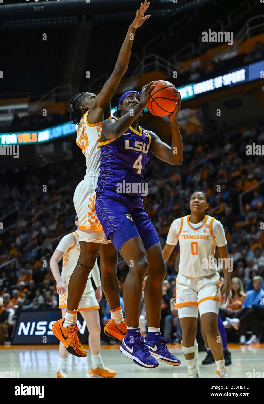 KNOXVILLE, TN - JANUARY 09: LSU Lady Tigers guard Flau'Jae Johnson (4) drives to the basket on ...