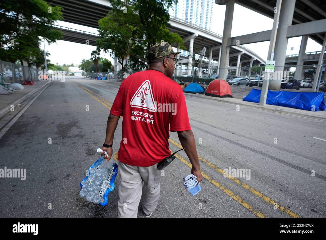 FILE - Ricky Leath, an outreach specialist with the City of Miami ...